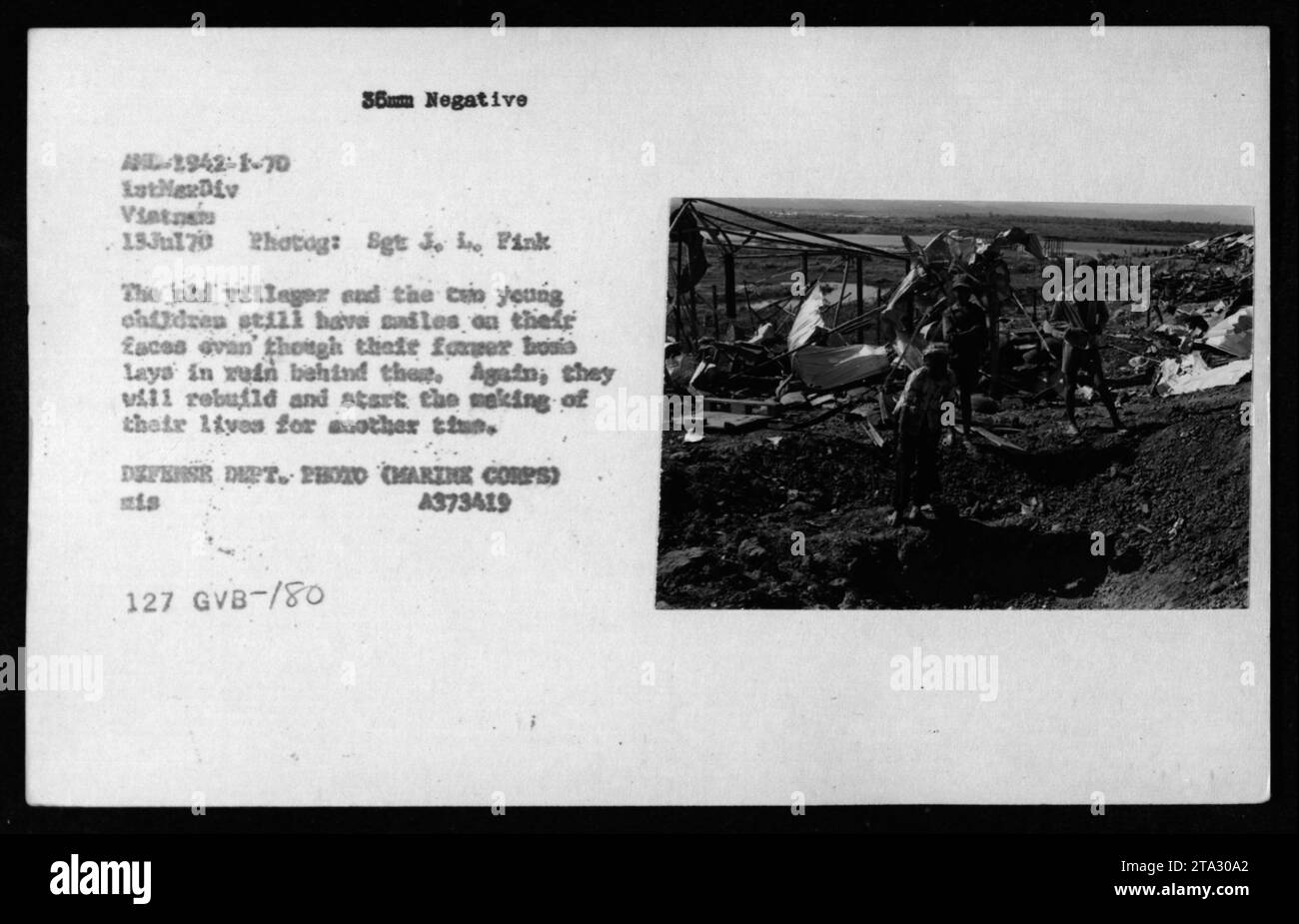 American soldiers inspecting a damaged village in Vietnam, June 13 ...