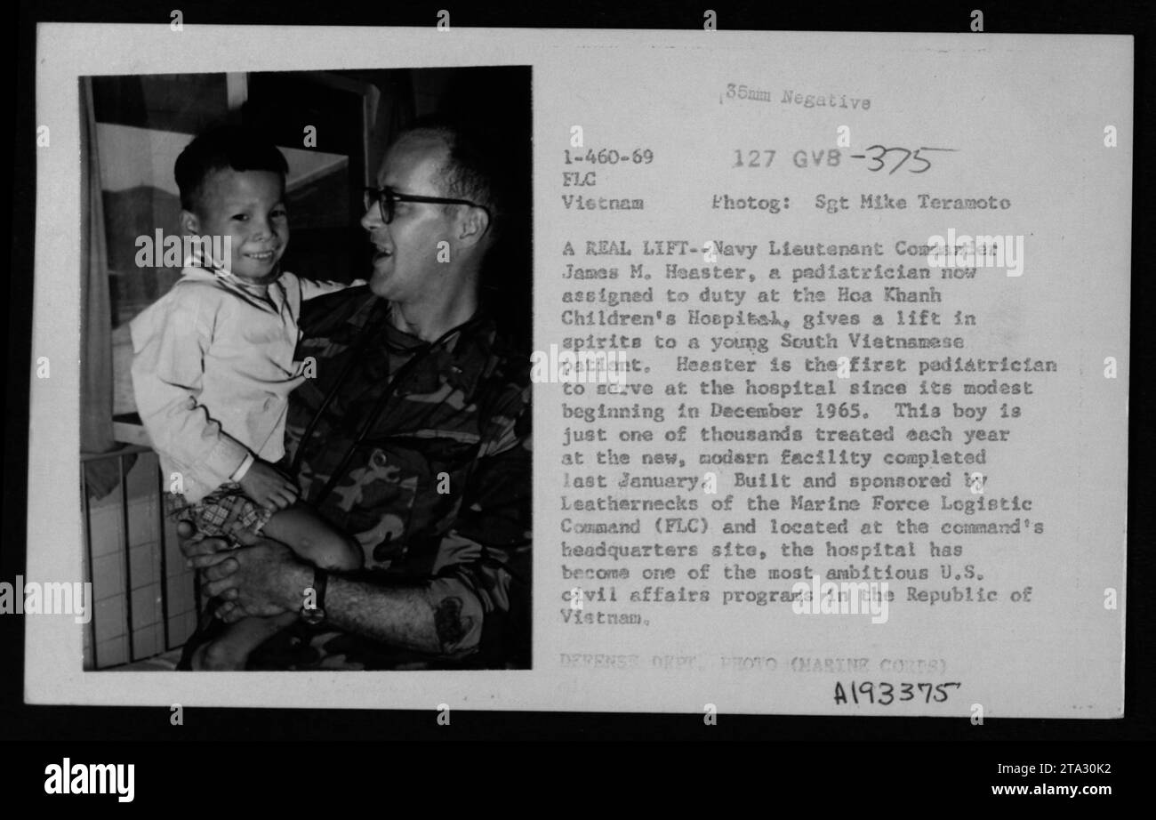 Navy Lieutenant Commander James M. Heaster, a pediatrician, provides ...
