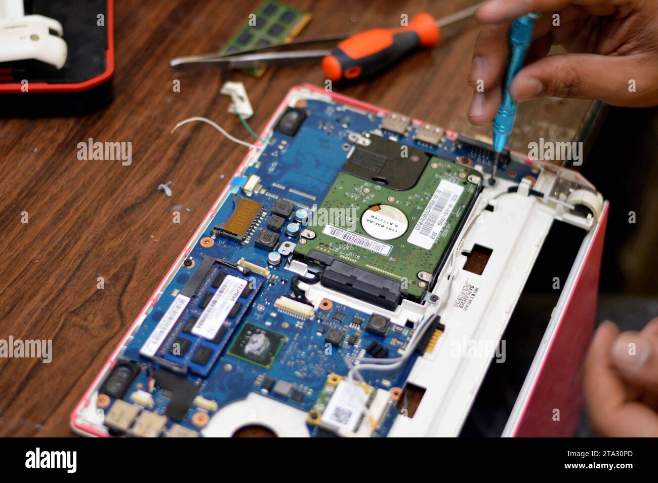 Cairo, Egypt, November 1 2023: maintenance of a laptop, fixing a ...