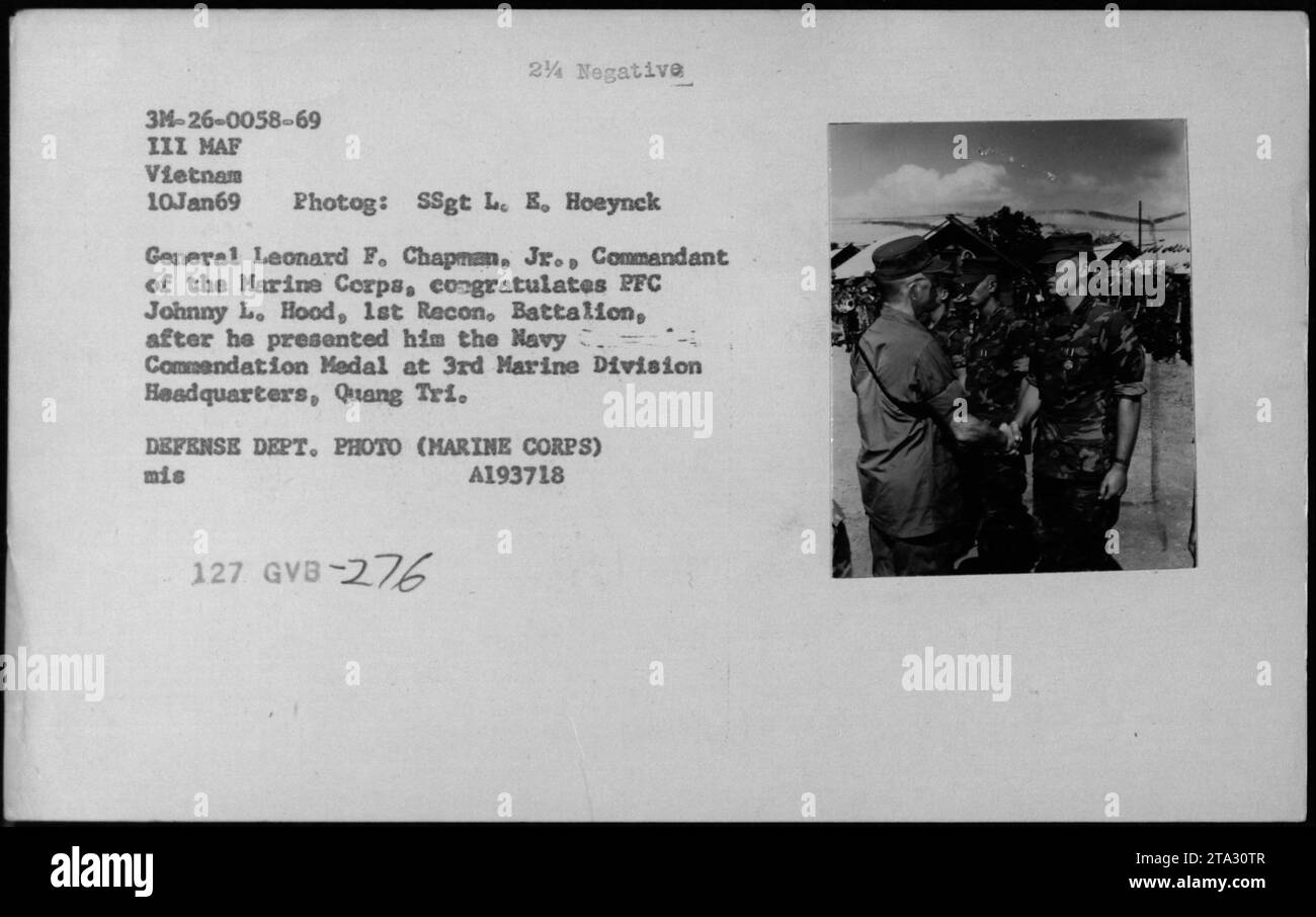 Gen Leonard F. Chapman, Commandant of the Marine Corps, congratulates ...