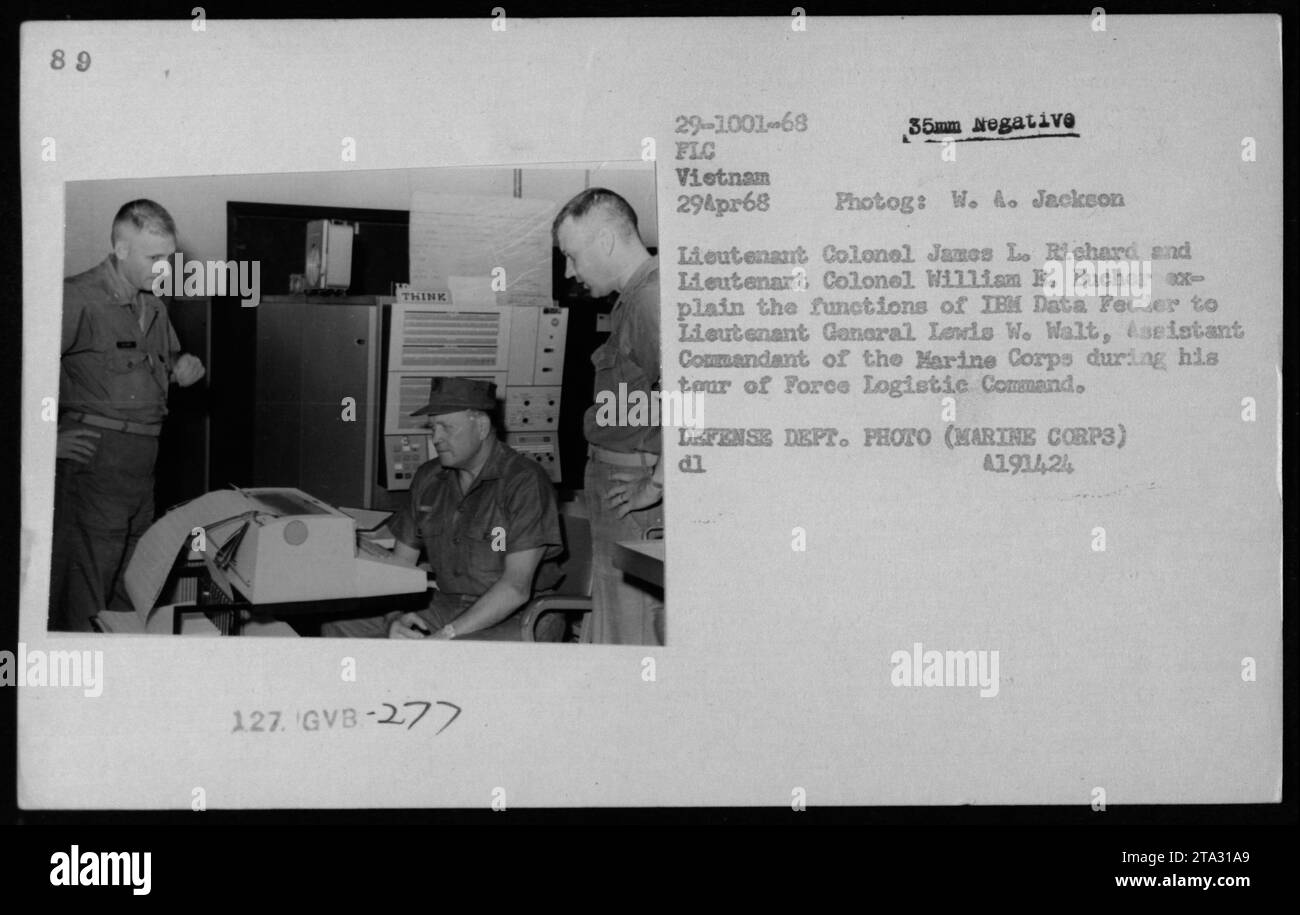 Lt Gen Lewis W. Walt is briefed by Lieutenant Colonels James L. Richard ...