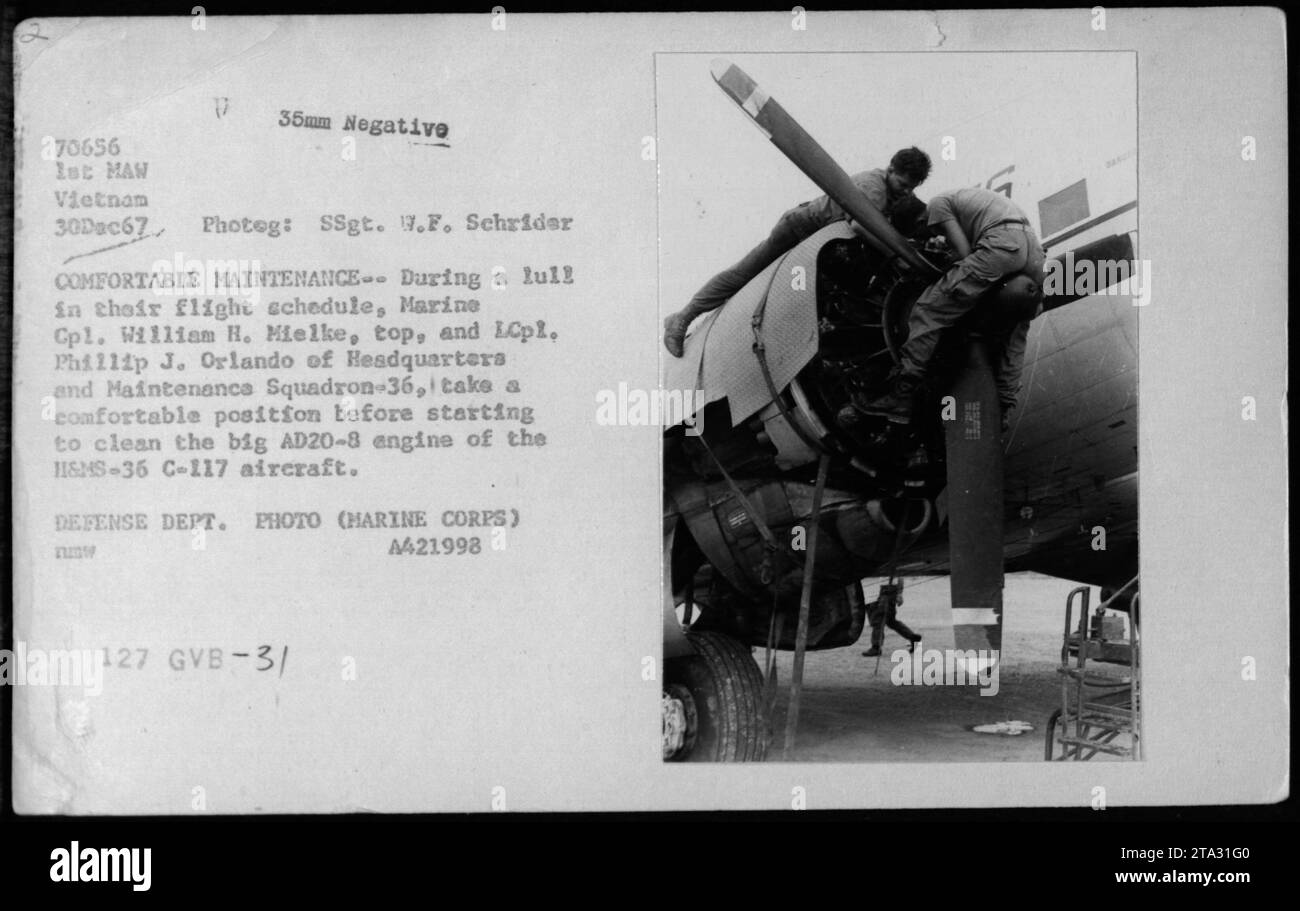 Marine Cpl. William H. Mielke and ICpl. Phillip J. Orlando of ...