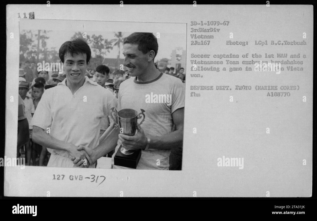 Soccer captains from 1st Marine Aircraft Wing and a Vietnamese team ...
