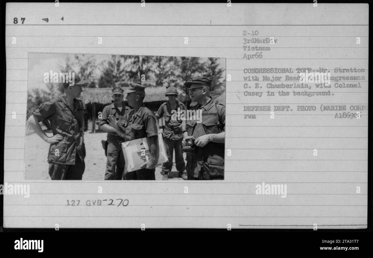 Lyndon Johnson, Col P X Kelley, and other officials are seen in this ...