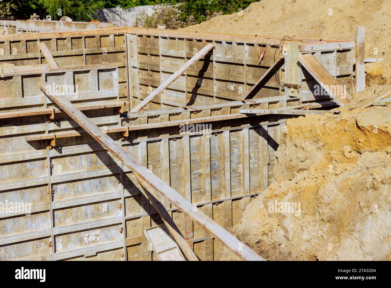 Formwork for pouring concrete for building house foundation has been ...