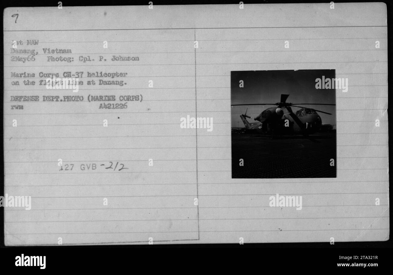 Marine Corps CH-37 helicopter is stationed on the flight line at Danang ...