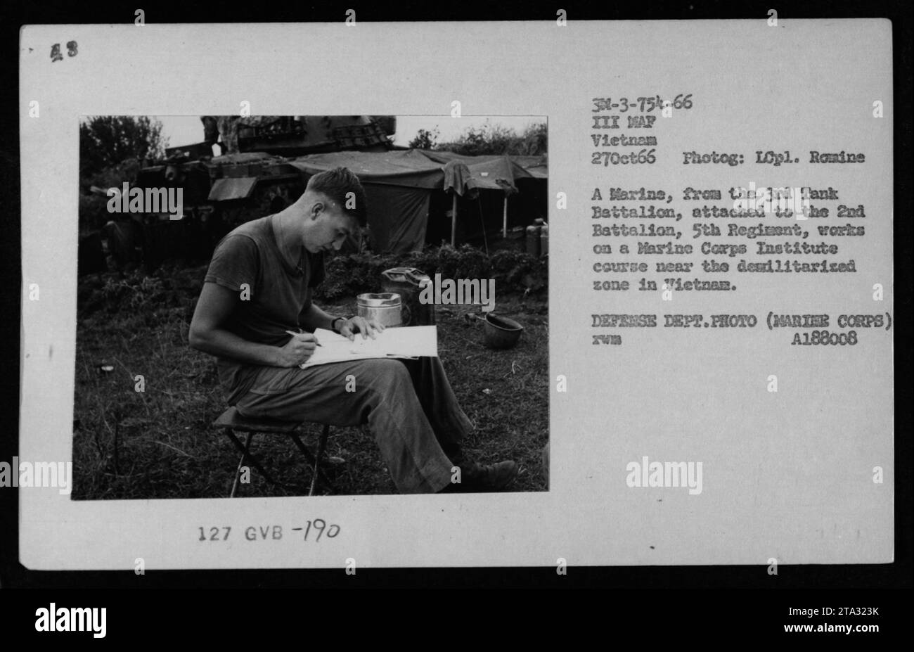 A Marine from the 3rd Tank Battalion, attached to the 2nd Battalion ...