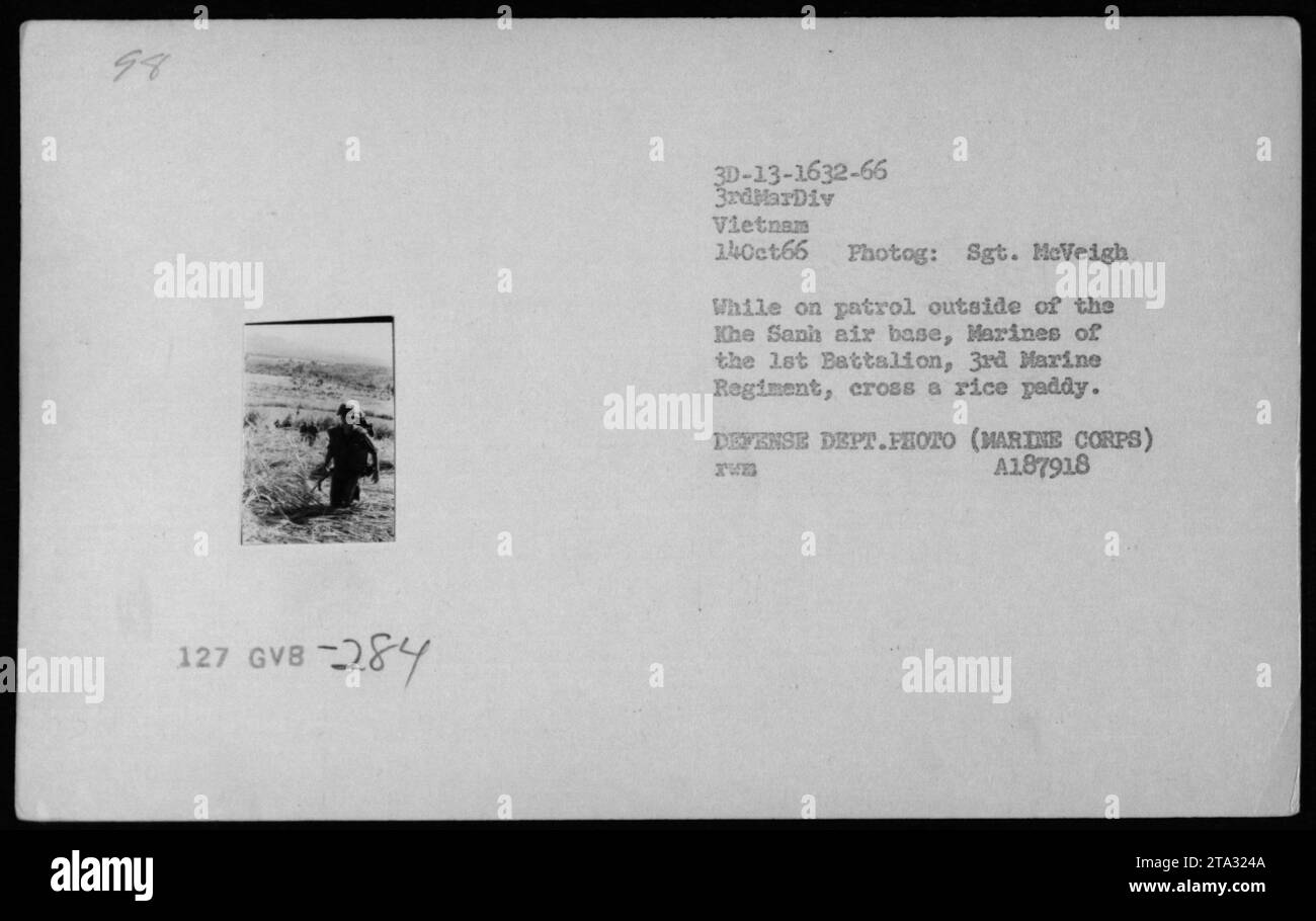 Marines from the 1st Battalion, 3rd Marine Regiment, are seen crossing ...