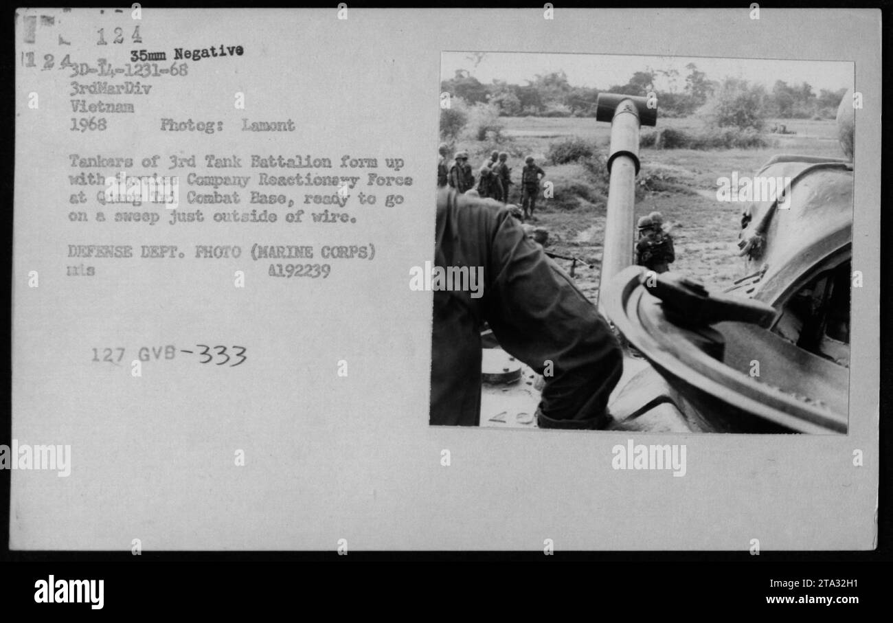 Tanks from the 3rd Tank Battalion of the 3rd Marine Division form up ...