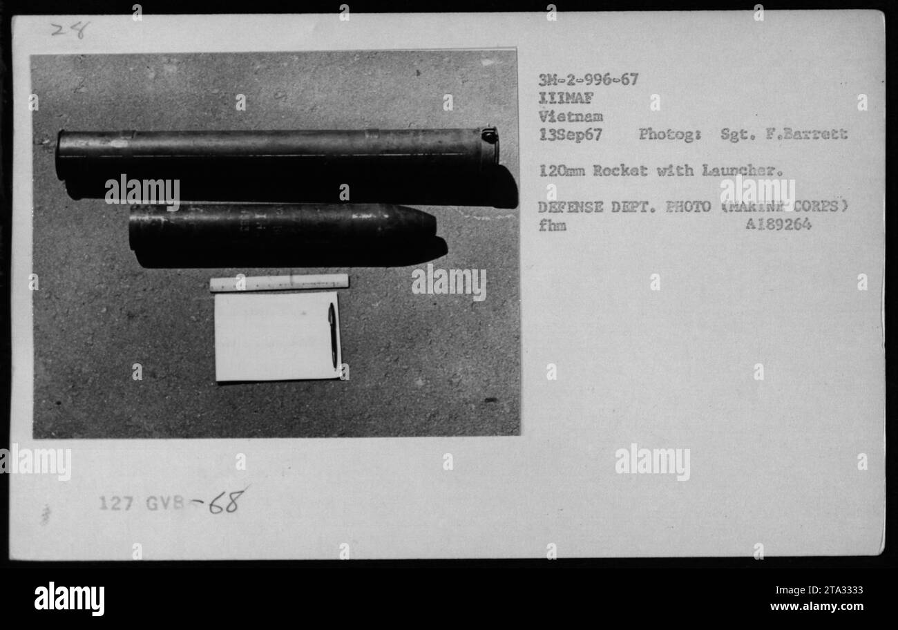 Marines inspect a captured 120mm rocket with launcher in Vietnam on ...