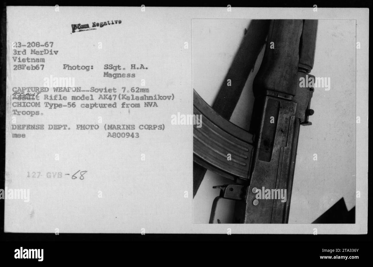 Caption: A photograph taken by SSgt. H.A. Magness depicting a captured ...