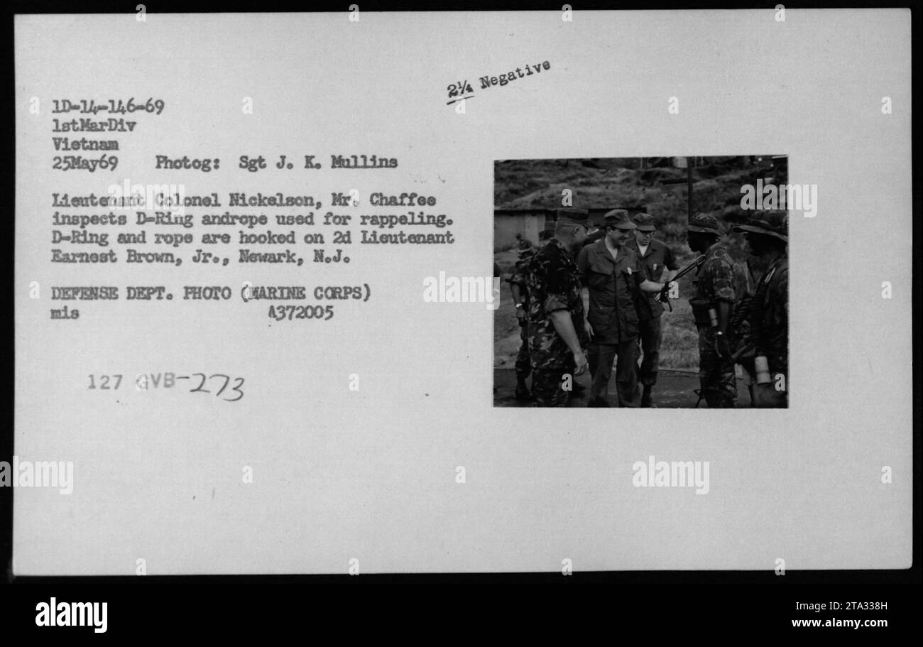 Lieutenant Colonel Nickelson and Mr. Chaffee inspect D-Ring and ...