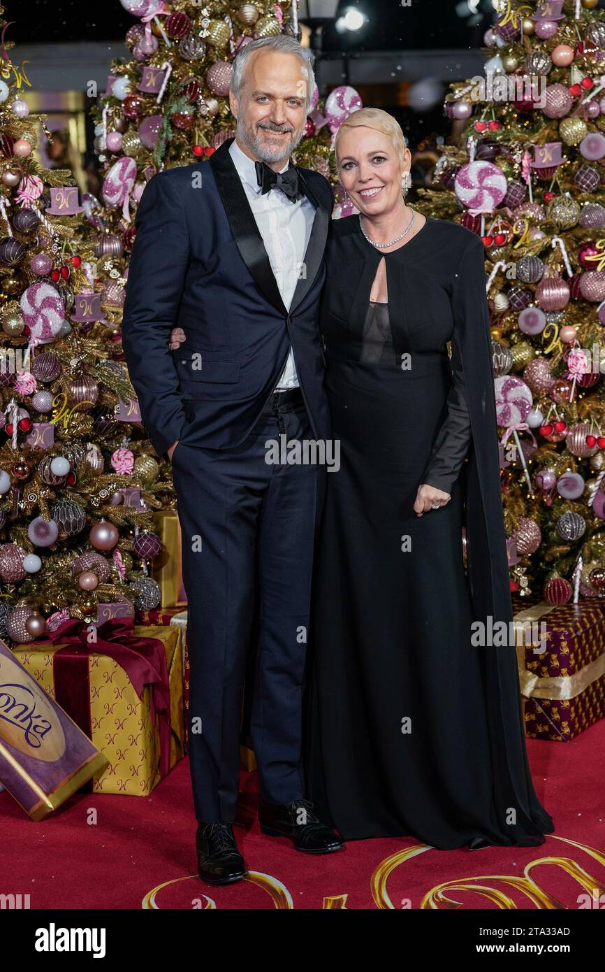 Ed Sinclair, left, and Olivia Colman pose for photographers upon ...