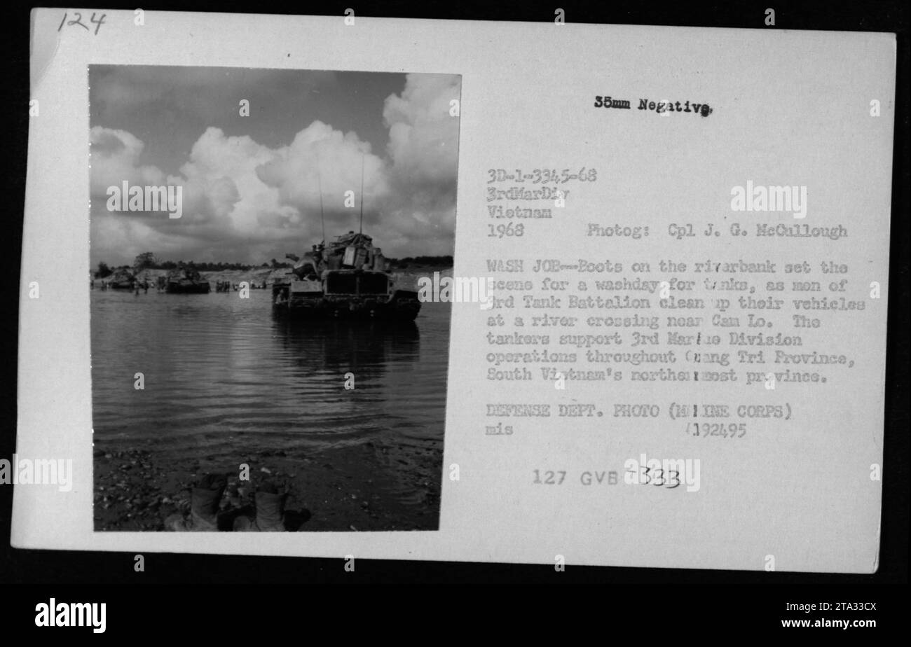 "Soldiers from the 3rd Tank Battalion clean their tanks at a river ...