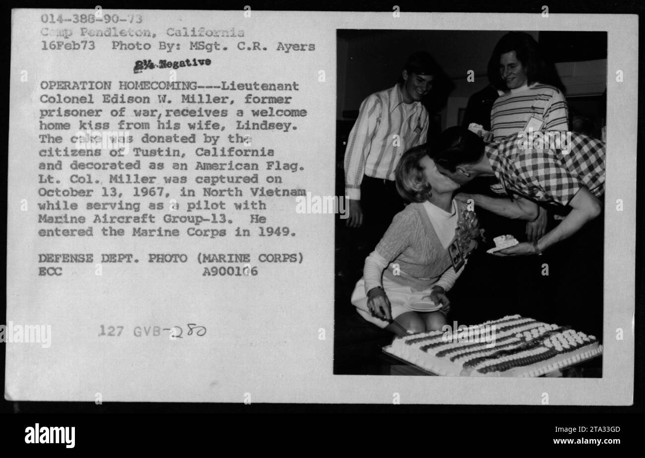 Lieutenant Colonel Edison W. Miller, a former prisoner of war, receives ...