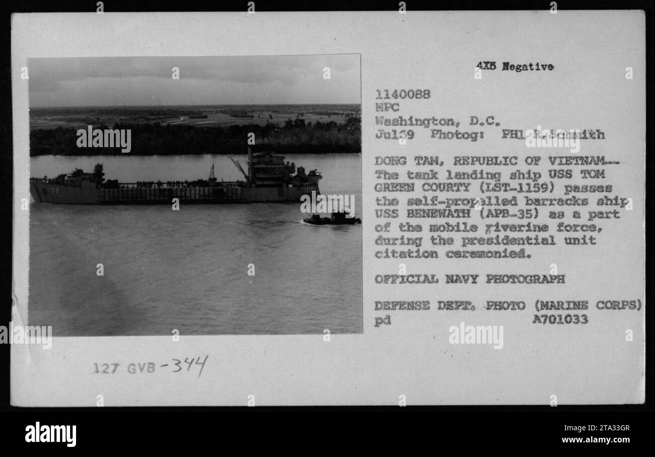 The tank landing ship USS TOM GREEN COURTY (IST-1159) passes the self ...