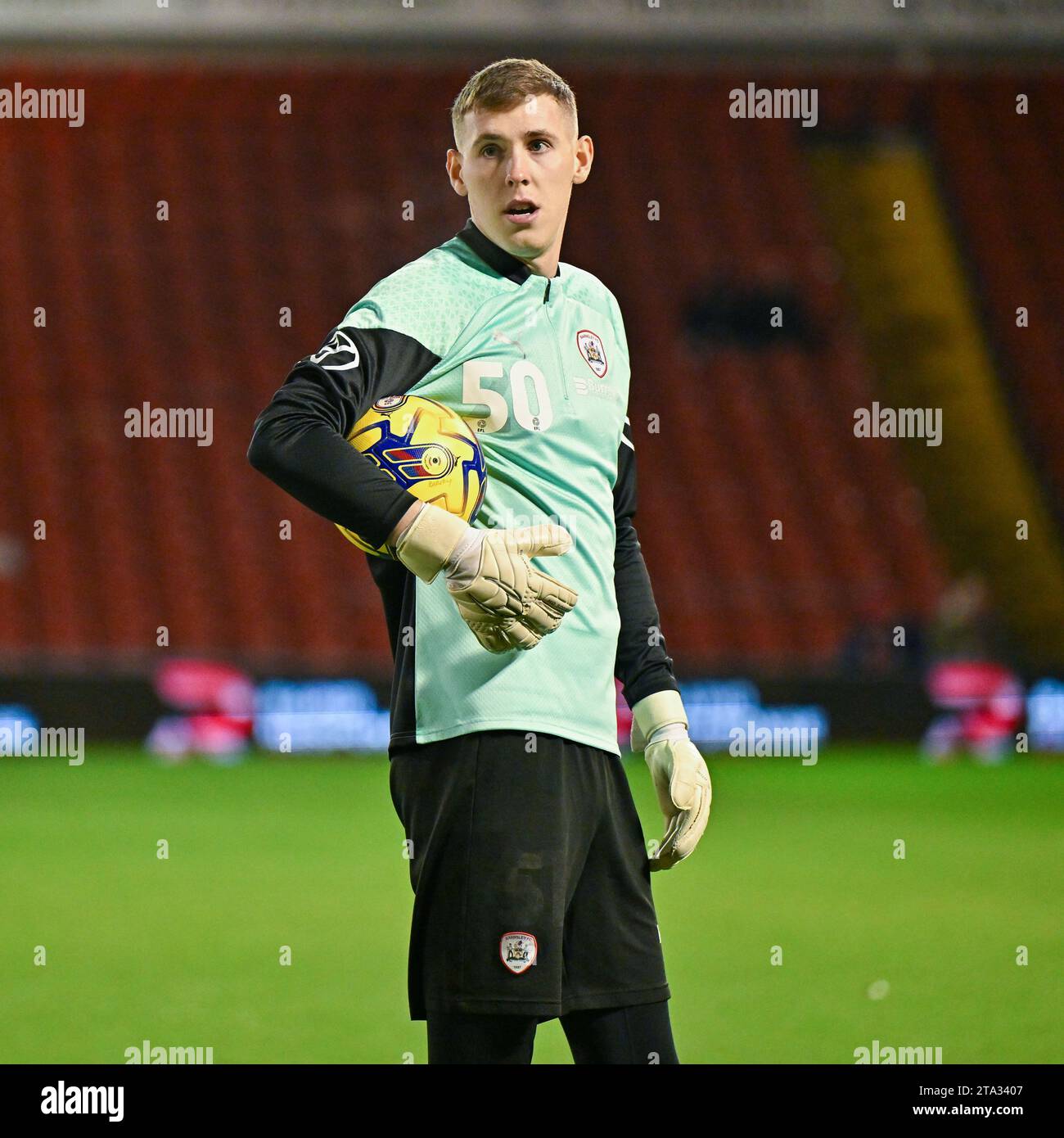Kieren Flavell #50 of Barnsley warms up ahead of the match, during the ...