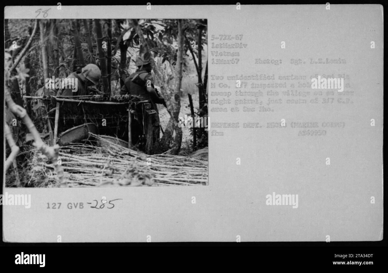 American soldiers from the 3rd Battalion, 22nd Company, 3/7 Infantry Division, are seen ...