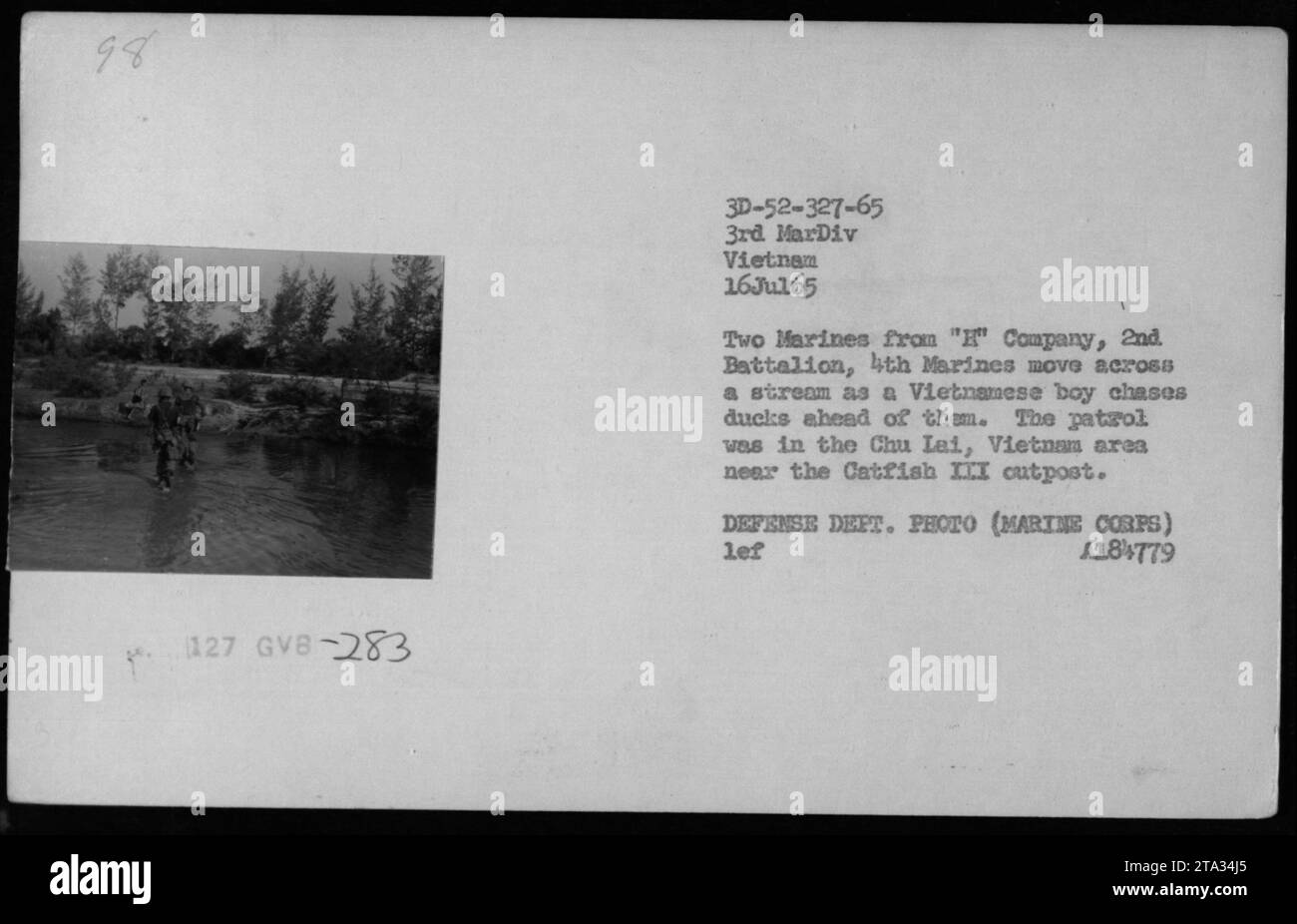 Marines from H Company, 2nd Battalion, 4th Marines, cross a stream near ...
