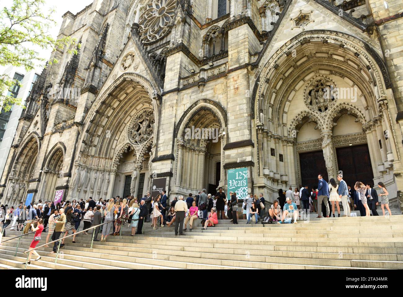 New York, USA - May 25, 2018: People near The Cathedral Church of St. John the Divine in New ...