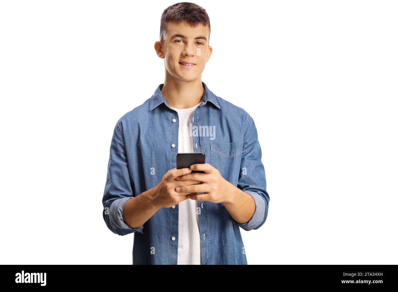 Generation z teenager using a smartphone isolated on white background ...