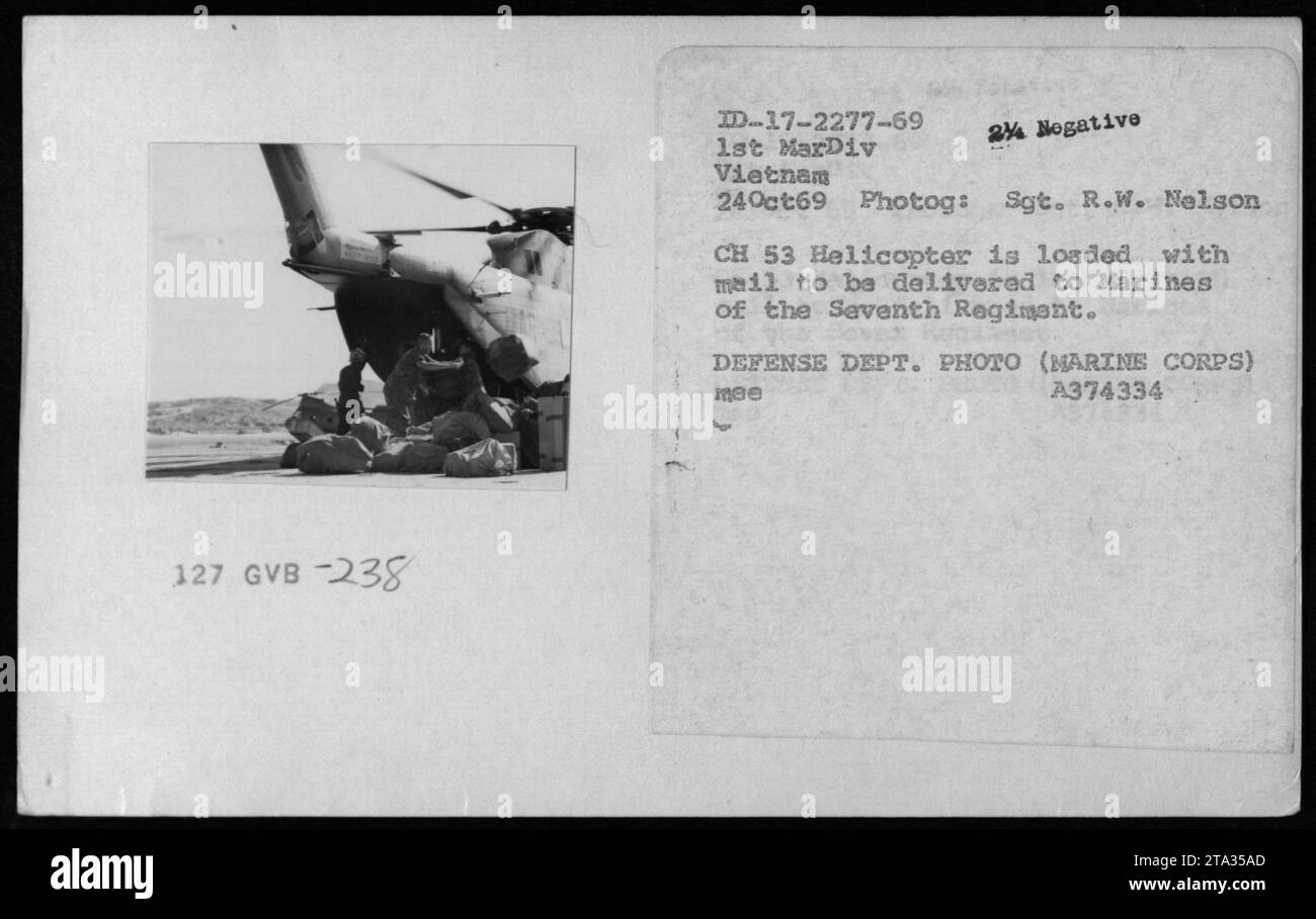 A CH-53 helicopter from the 1st Marine Division delivers mail to the ...