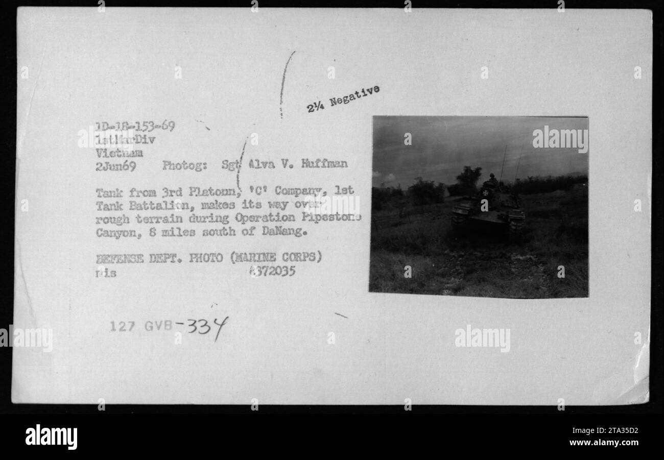 A tank from the 1st Tank Battalion, 1st Marine Division, can be seen ...