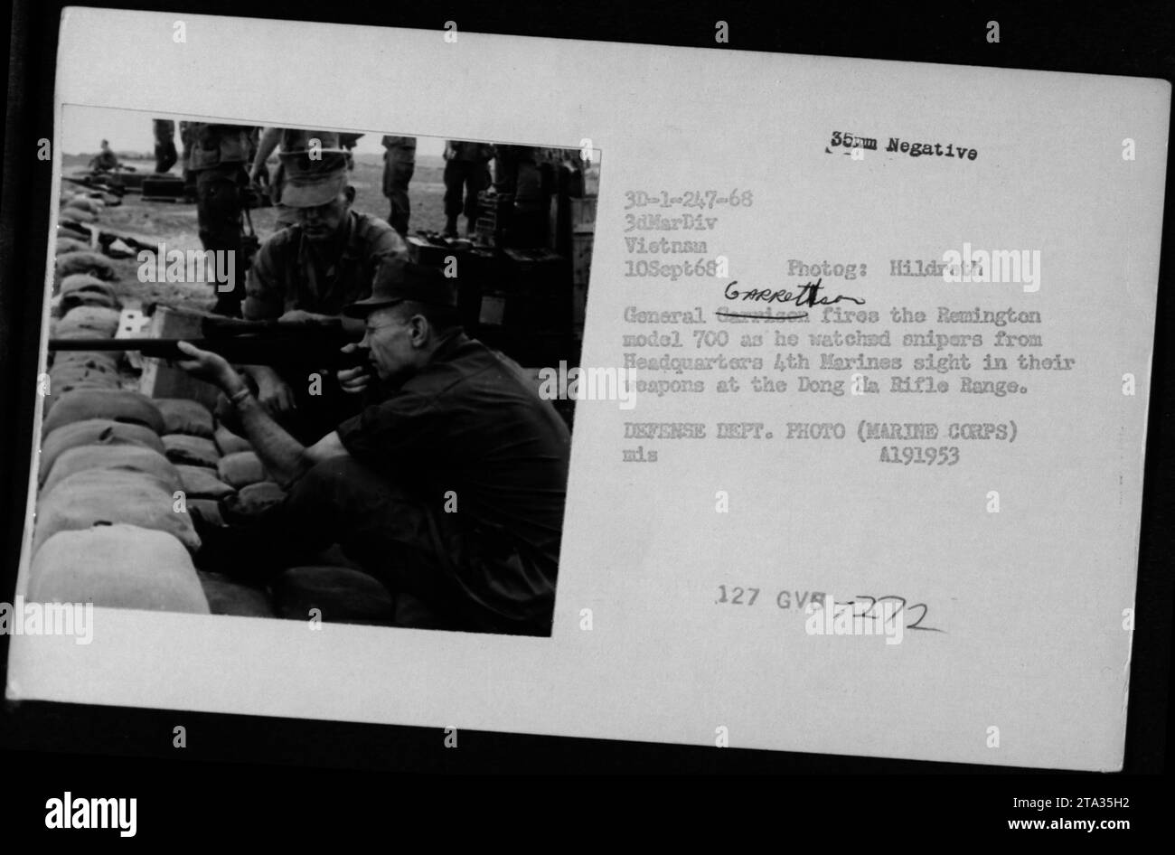 General Gison fires the Remington model 700 rifle as he observes ...