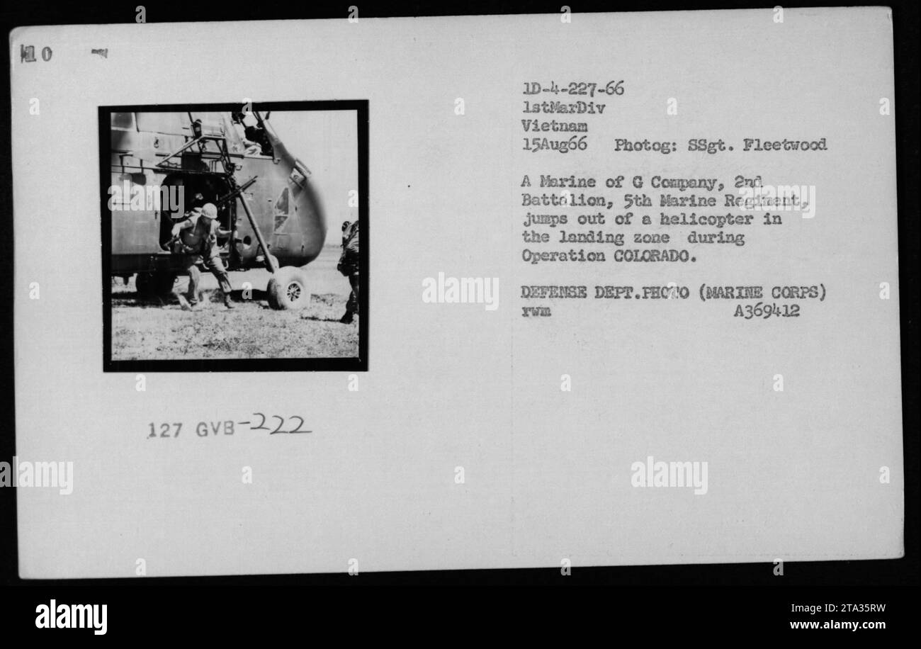 A Marine from G Company, 2nd Battalion, 5th Marine Regiment jumps from ...