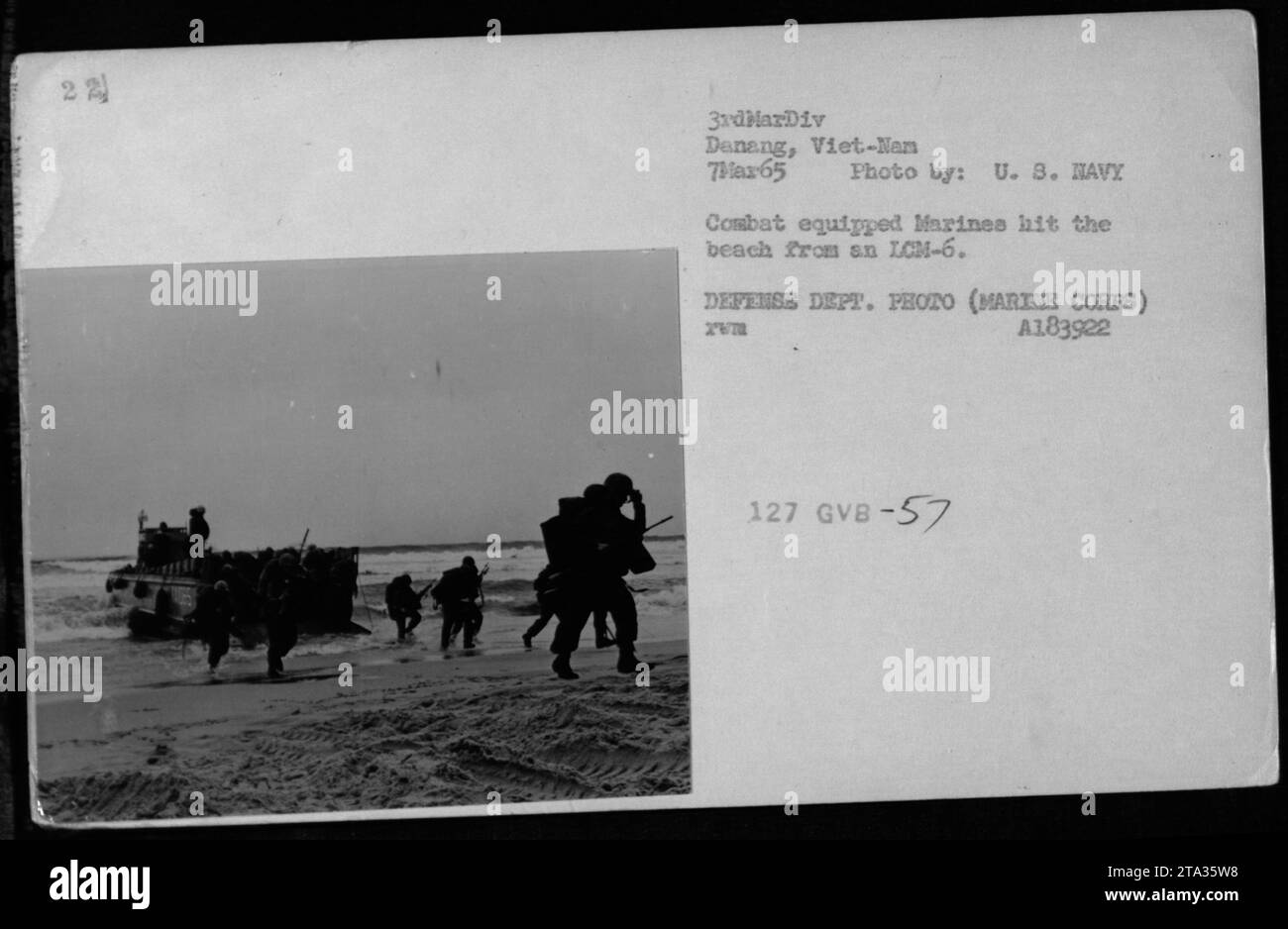 Combat equipped Marines landing on the beach from an LCM-6 during the ...