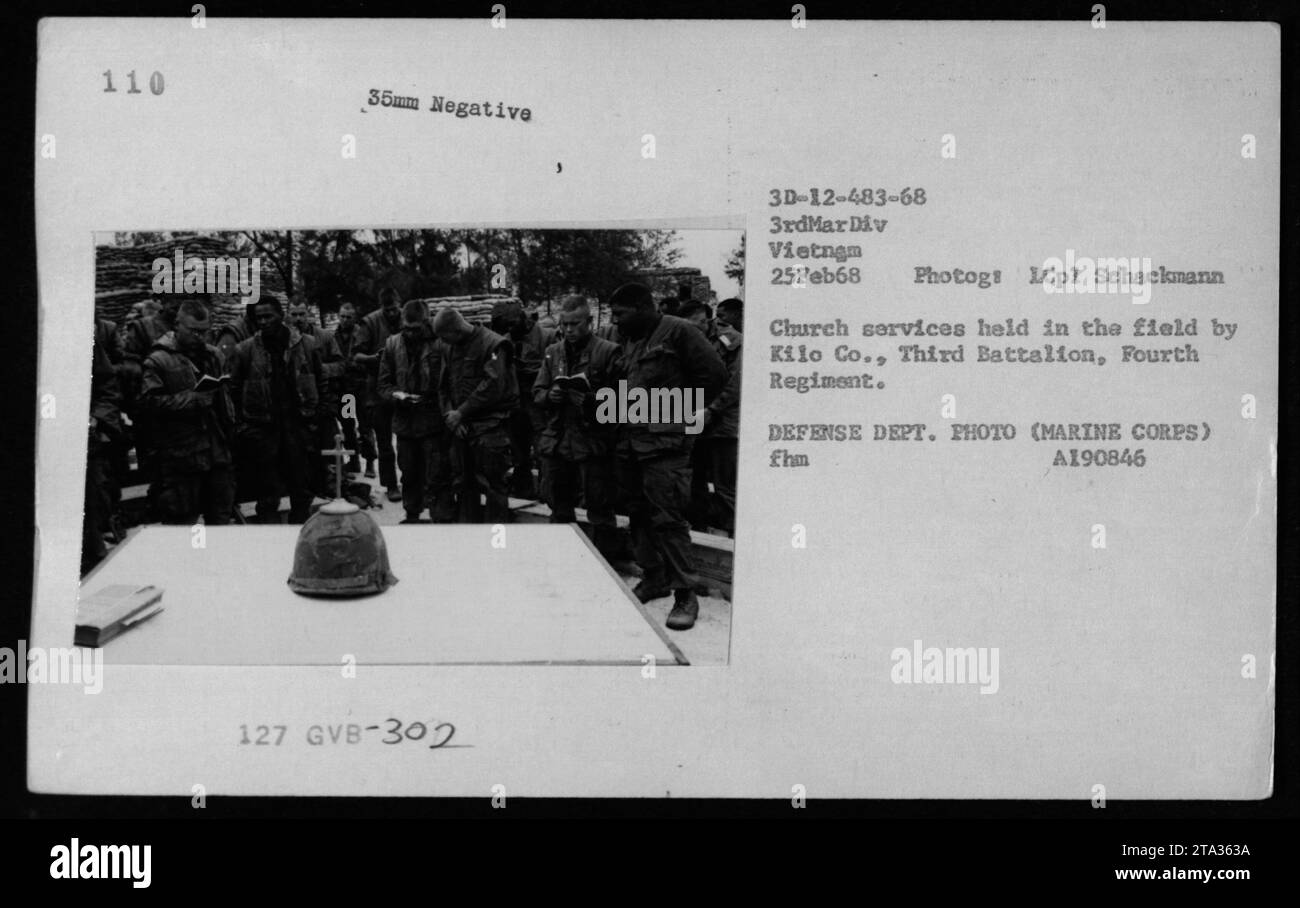 Soldiers attending a field church service conducted by Kilo Company ...