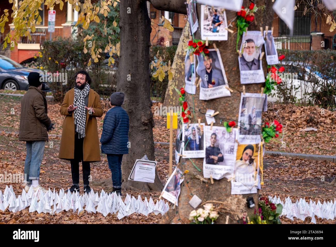 Community residents, from left, Gidon Kaminer, Bennett Kuhn, and Hazami ...