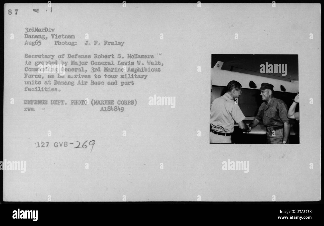 Secretary of Defense Robert S. McNamara is welcomed by Major General ...