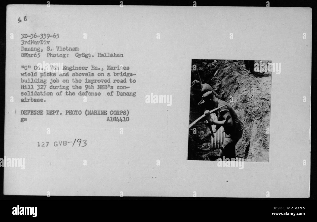 1st Lt. James Huckmans uses a heavy-duty piece of construction ...