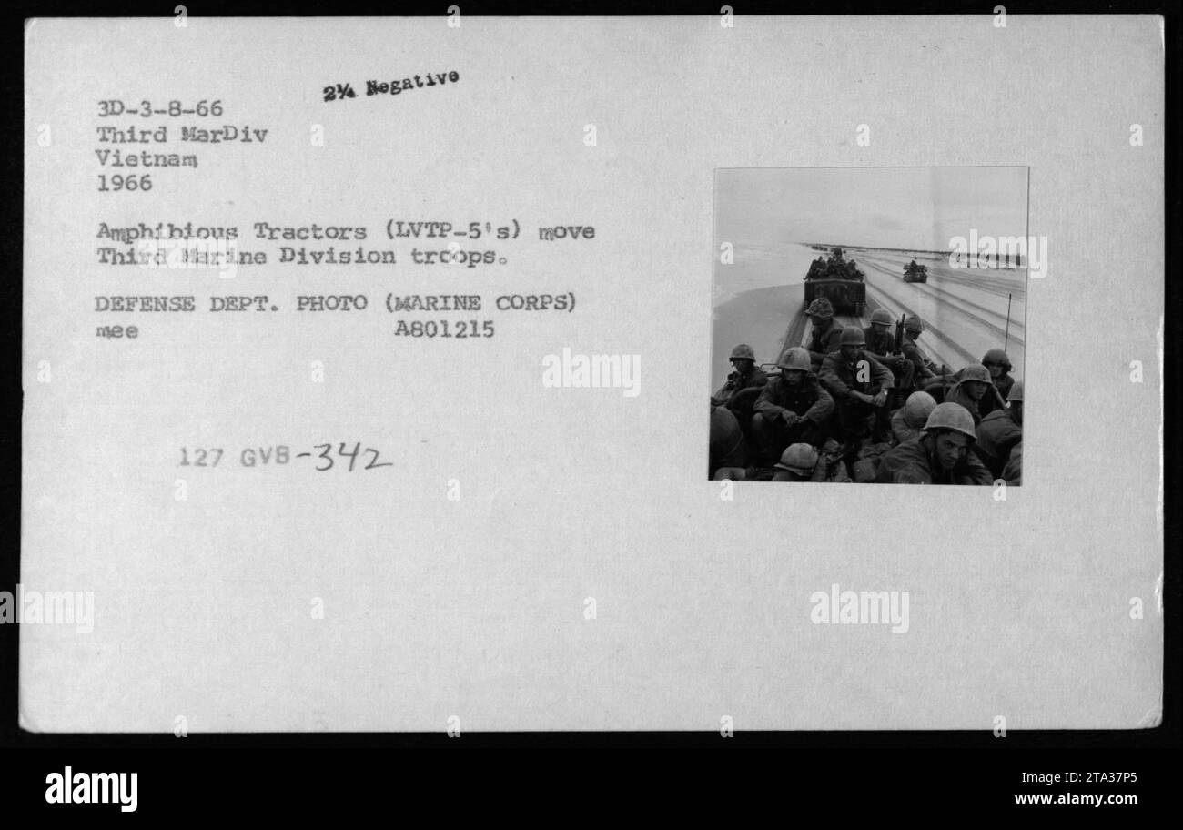 Amphibious Tractors (LVTP-5's), carrying Third Marine Division troops ...