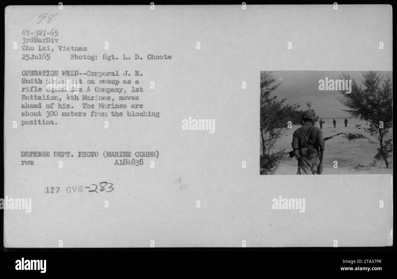 Marine Corporal J.E. Smith of A Company, 1st Battalion, 4th Marines ...