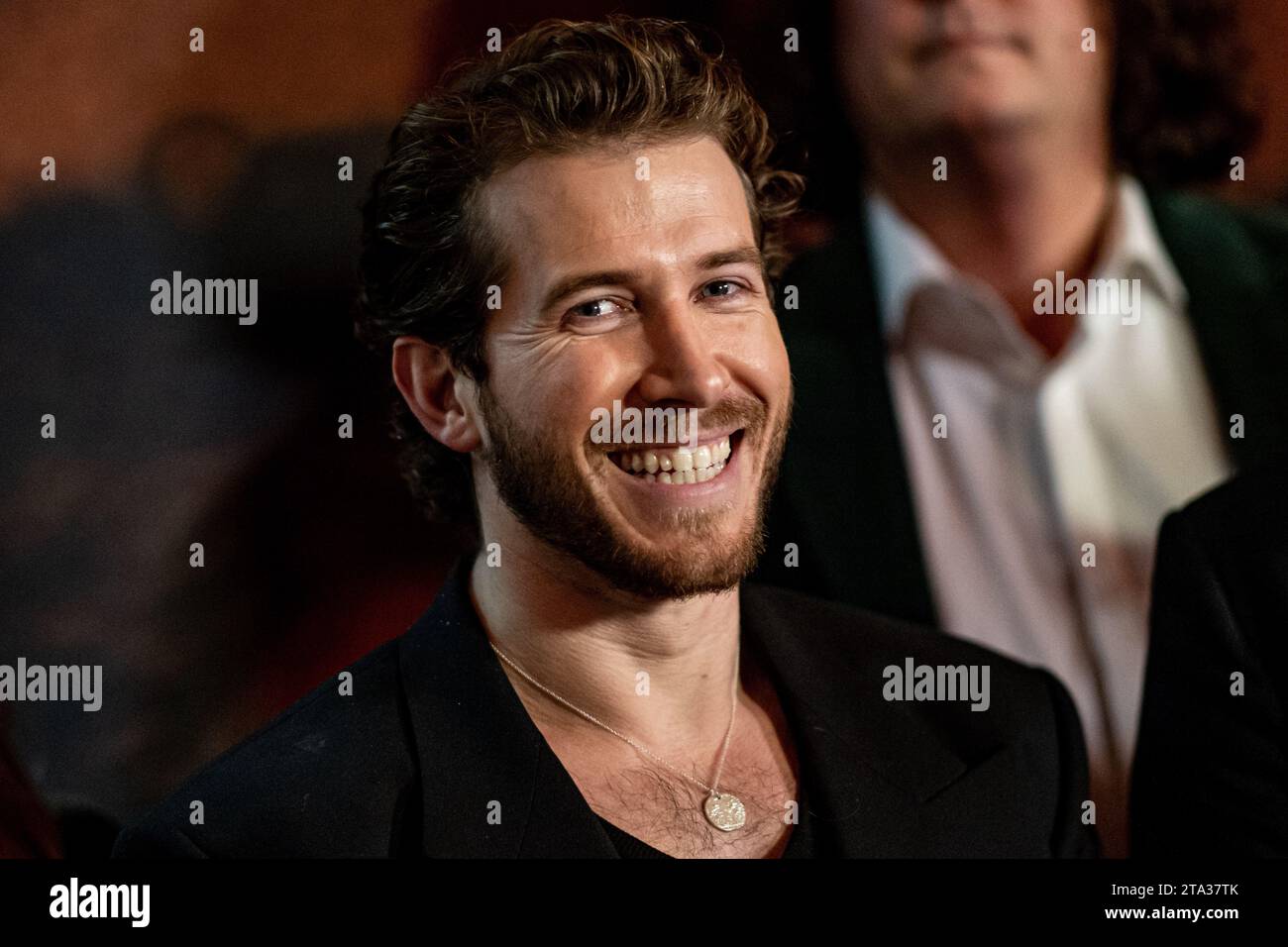 Berlin, Germany. 28th Nov, 2023. Chris Fulton, actor, walks the red ...