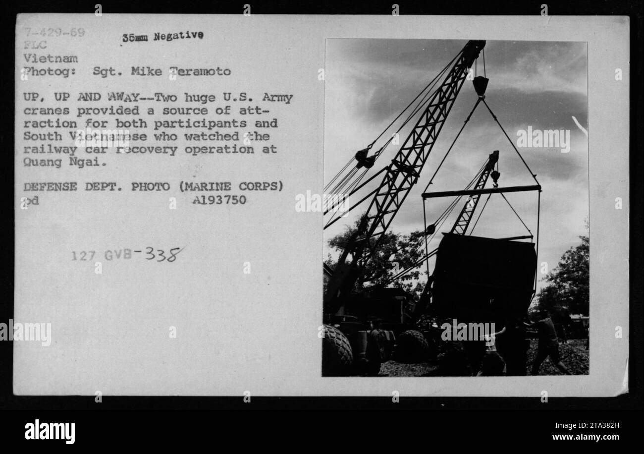 U.S. Army cranes recover a railway car in Quang Ngai, Vietnam, with ...