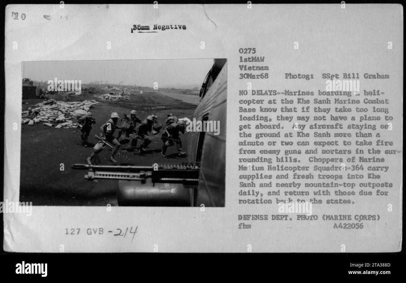 Marines board helicopters at Khe Sanh Marine Combat Base on March 30 ...