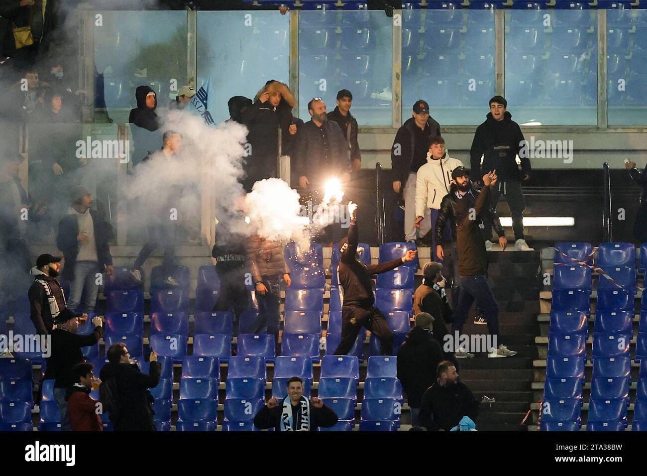 Smoke thrown by Lazio fans at Celtic fans during the UEFA Champions ...