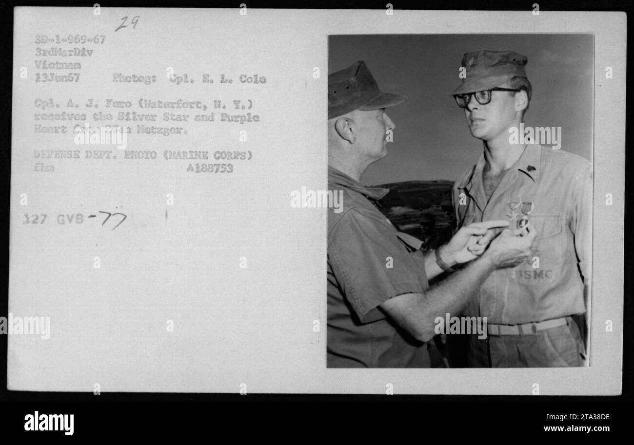 Cpl. E. L. Cole received the Silver Star and Purple Heart from ...