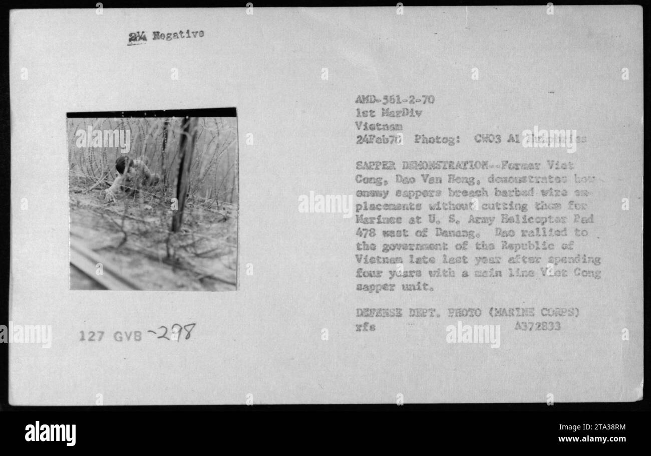 Reformed Viet Cong (Kit Carson Scouts) demonstrate how sappers breach ...