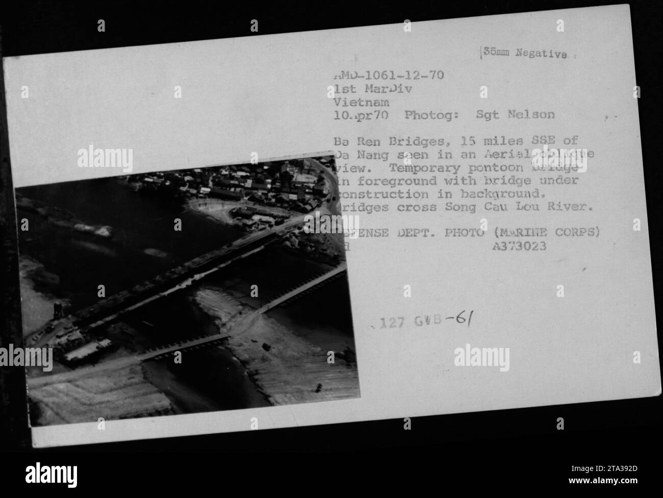 An aerial view shows a temporary pontoon bridge and a bridge under ...