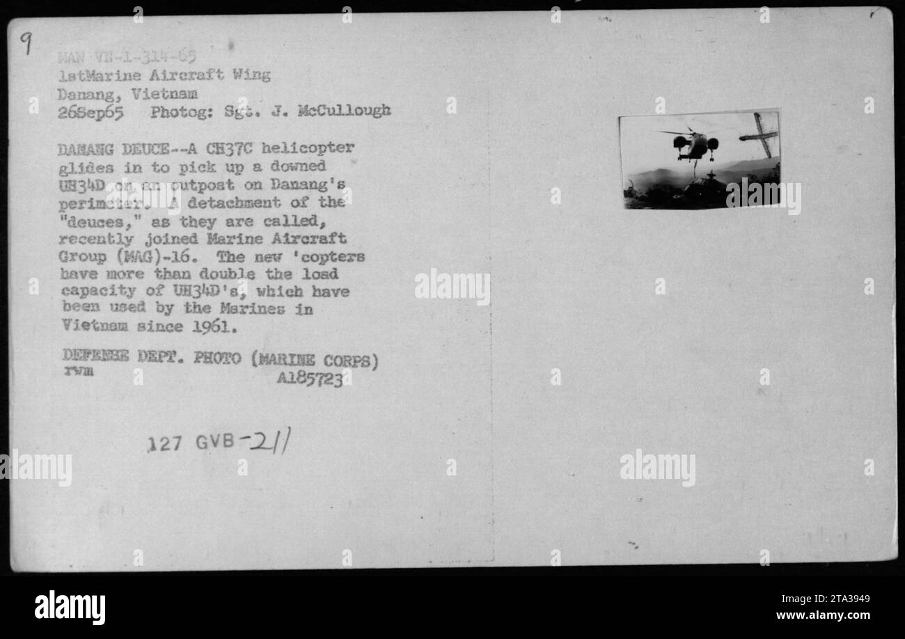 "CH37C helicopter retrieving a downed UH34D on Danang's perimeter. The ...