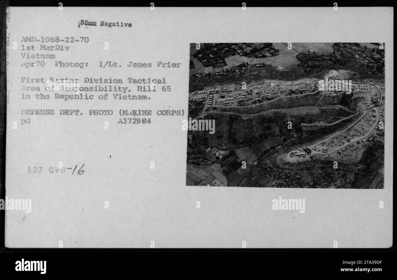 Soldiers from the First Marine Division are gathered on Hill 65 in the ...