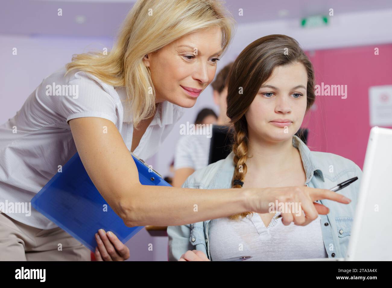 positive woman and student examining dna model Stock Photo - Alamy