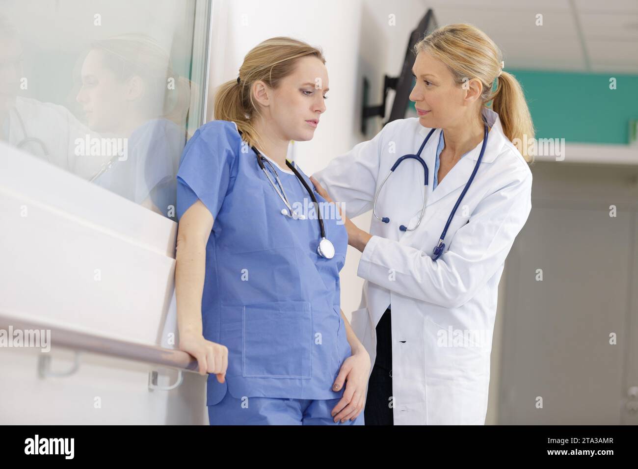 a pregnant doctor feeling ill Stock Photo - Alamy