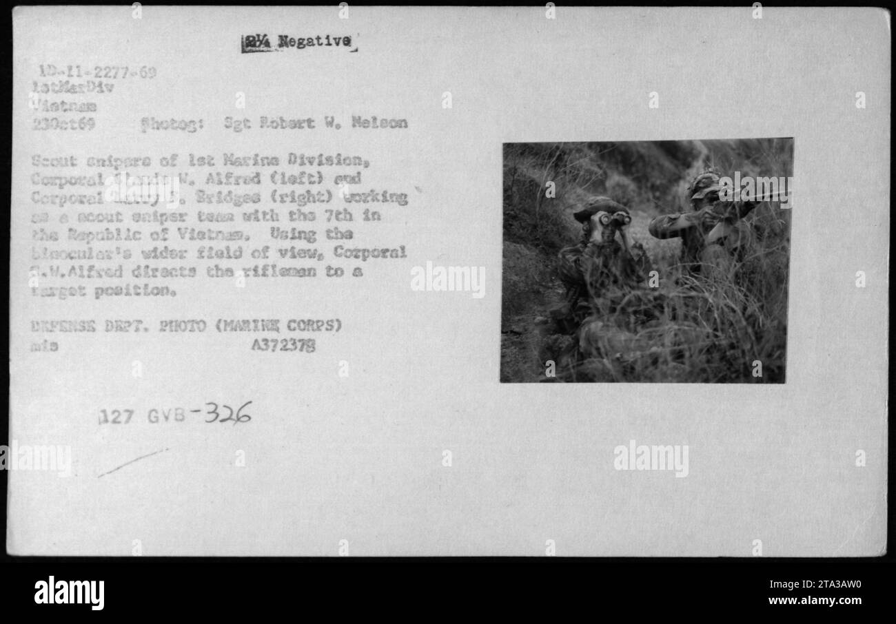 Marines Corporal Claude W. Alfred (left) and Corporal Larry E. Bridges ...