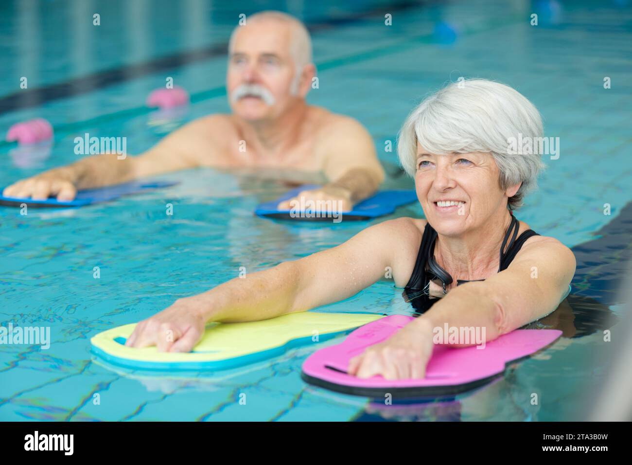 elderly doing aqua exercises in the pool Stock Photo - Alamy