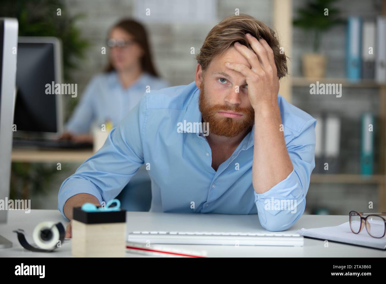 depressed male office worker at his desk Stock Photo - Alamy